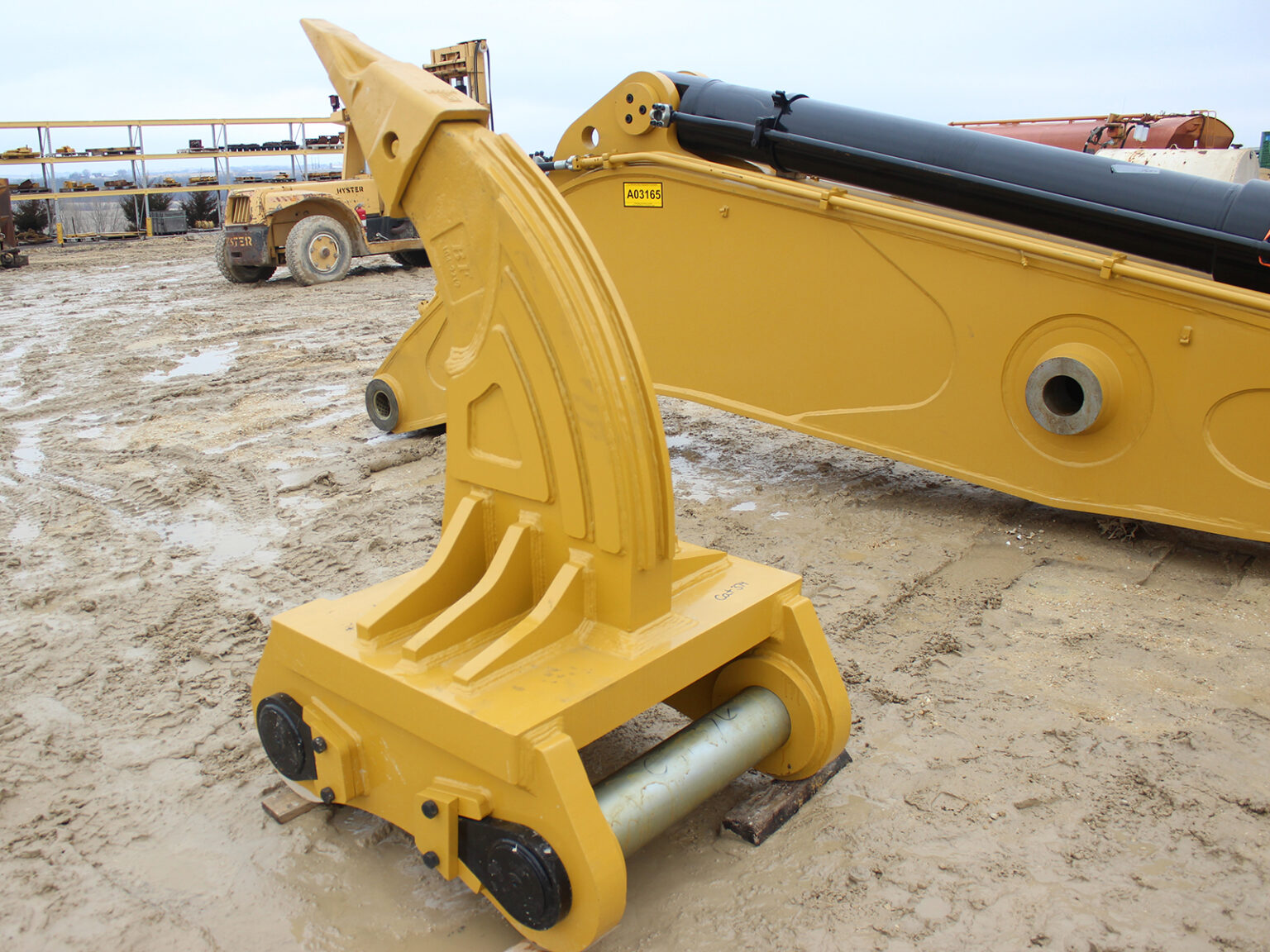 J.J. Scheckel “Rock Eater” Boom Ripper System for Cat 374FL - J.J. Scheckel